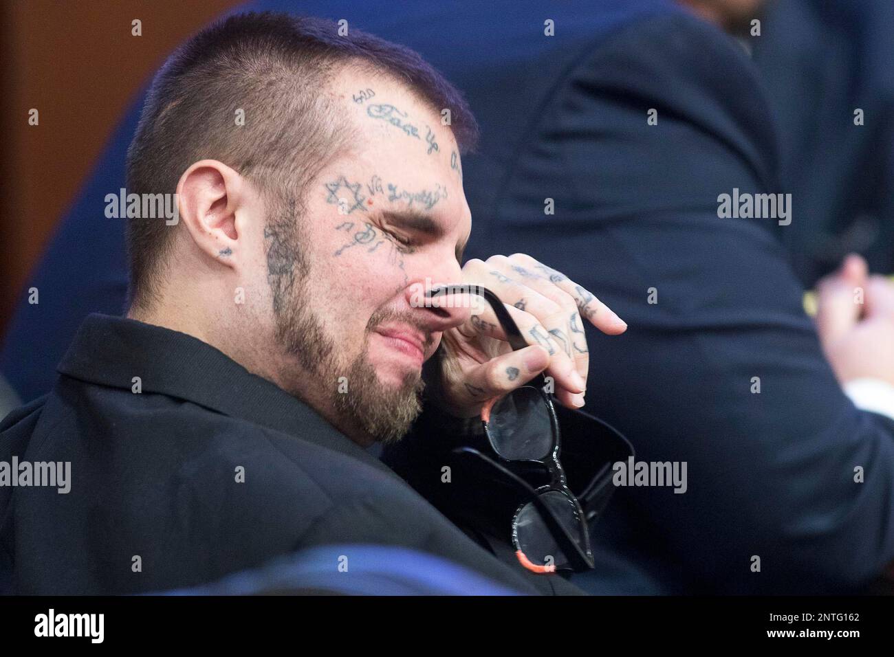 Christopher McNabb becomes emotional while listening to a recording of ...