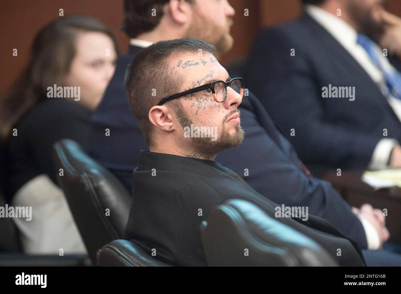 Christopher McNabb watches as his lawyer Anthony Carter speaks during ...