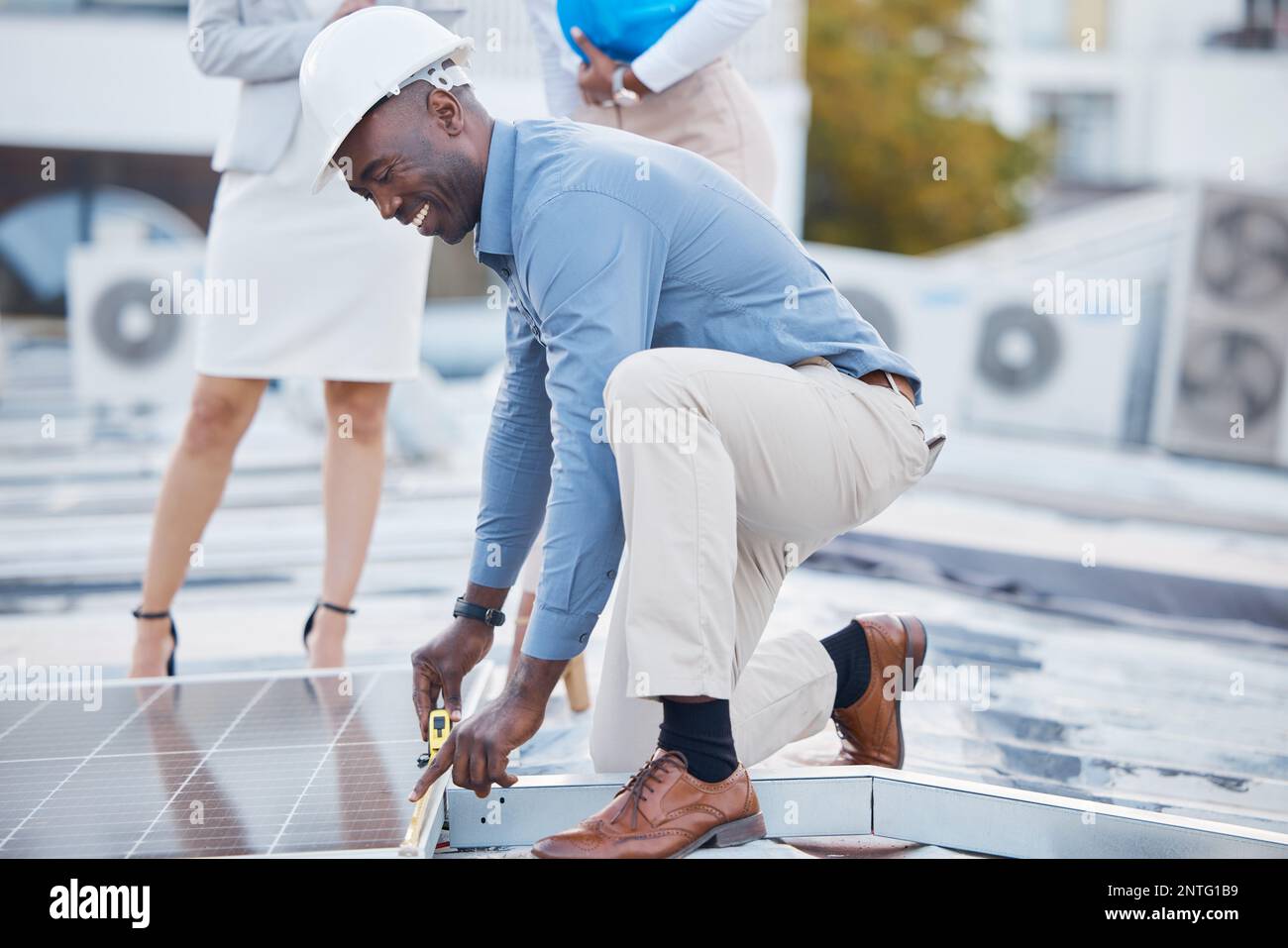 Black man, engineer and solar panel grid installation of construction ...