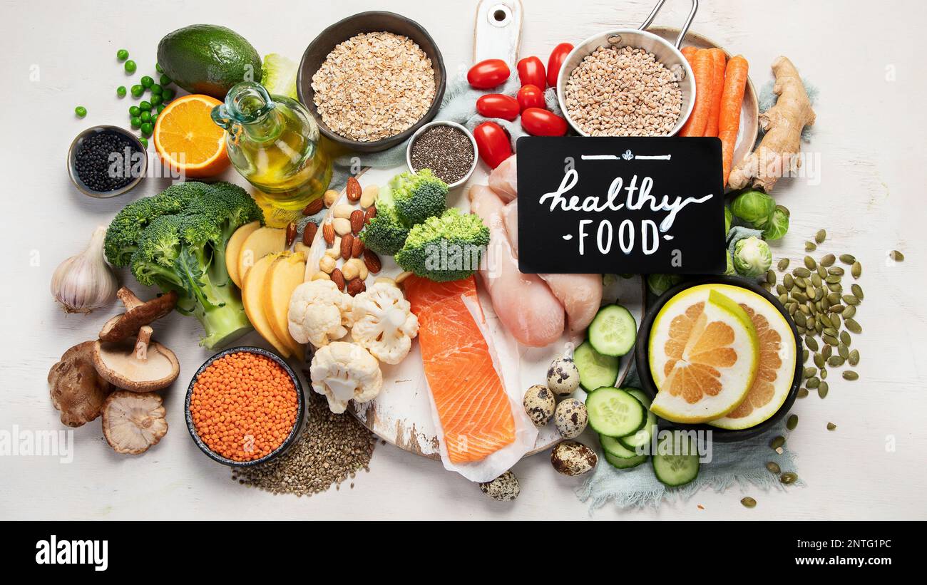 Healthy food selection on white background. Detox and clean diet ...