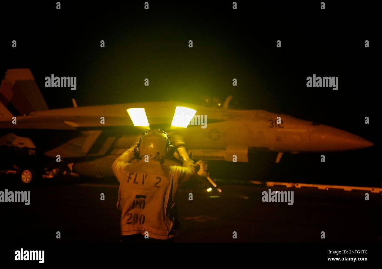 In this Friday, May 10, 2019 photo released by the U.S. Navy, an F/A ...