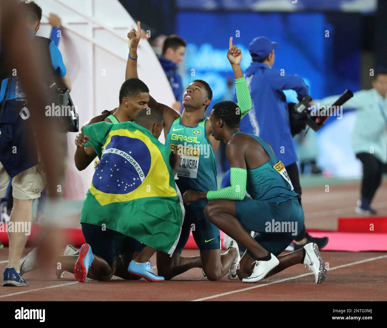 Brazil's runners celebrate after winning 4x100 Metres Relay Men Final ...