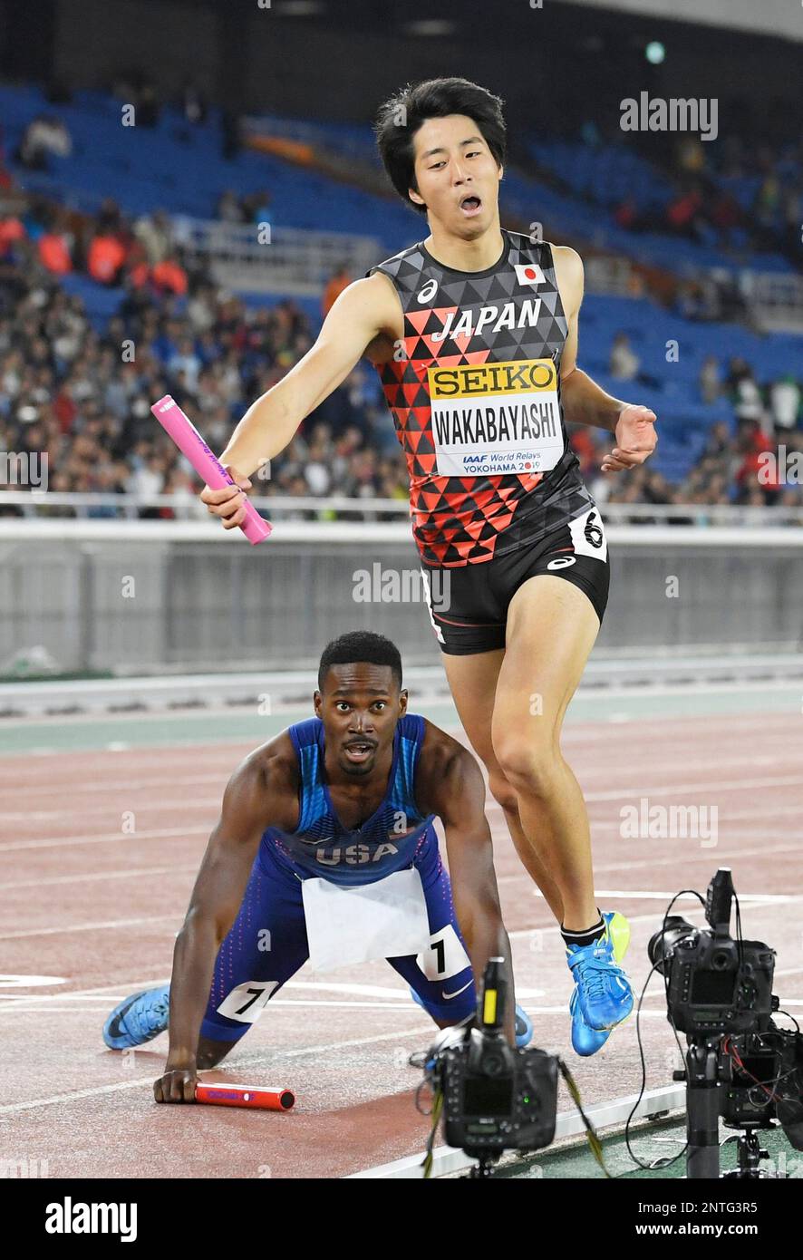 Japan's Kota Wakabayashi crosses the finish line as Paul Dedewo of the ...