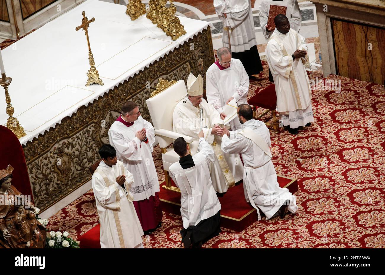 Pope Francis blesses a new priest during an ordination ceremony in St ...