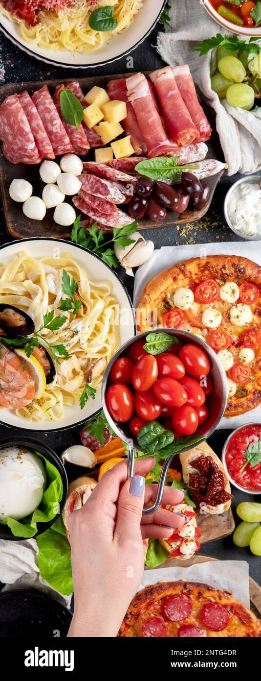 Italian food dishes on dark background. Traditional italian cuisine ...