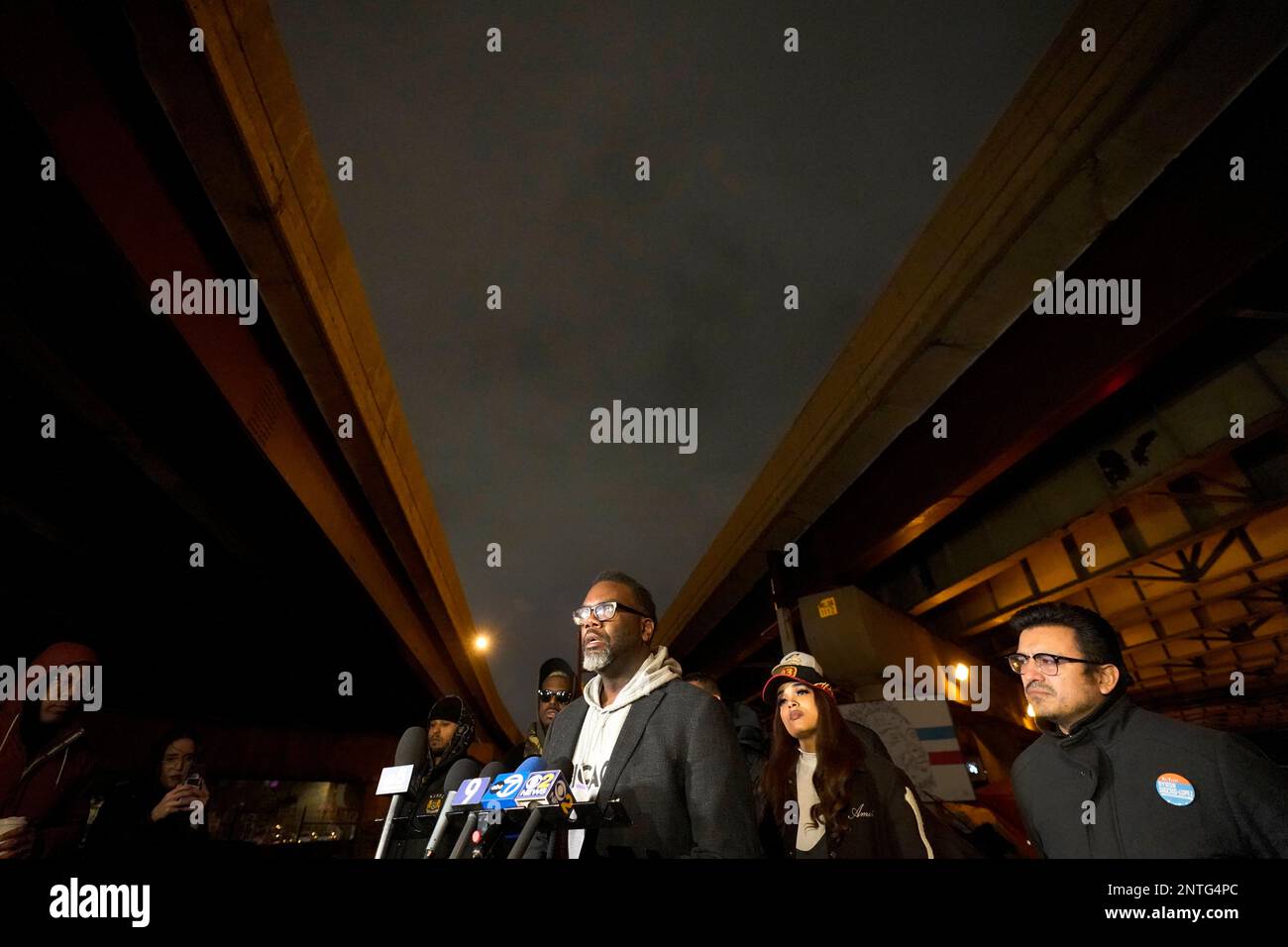 Chicago mayoral candidate Brandon Johnson, left, stands with homeless ...