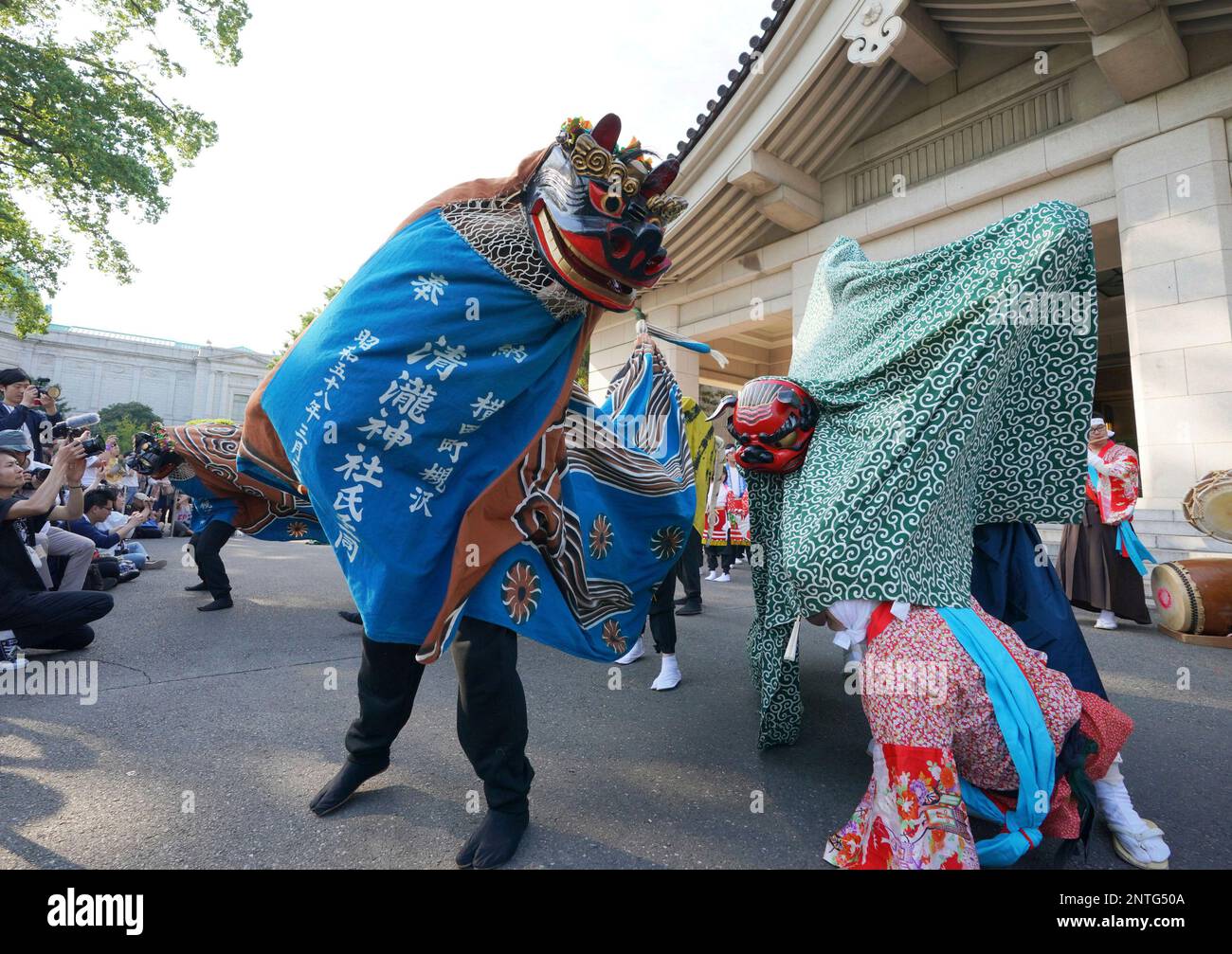 Shishimai, lion dances, are performed during an event Tokyo Shishimai ...