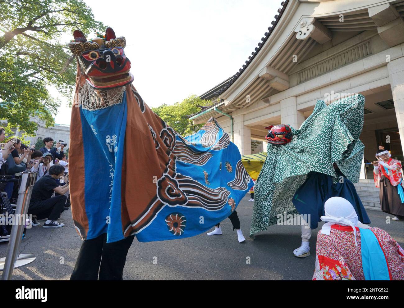 Shishimai, lion dances, are performed during an event Tokyo Shishimai ...