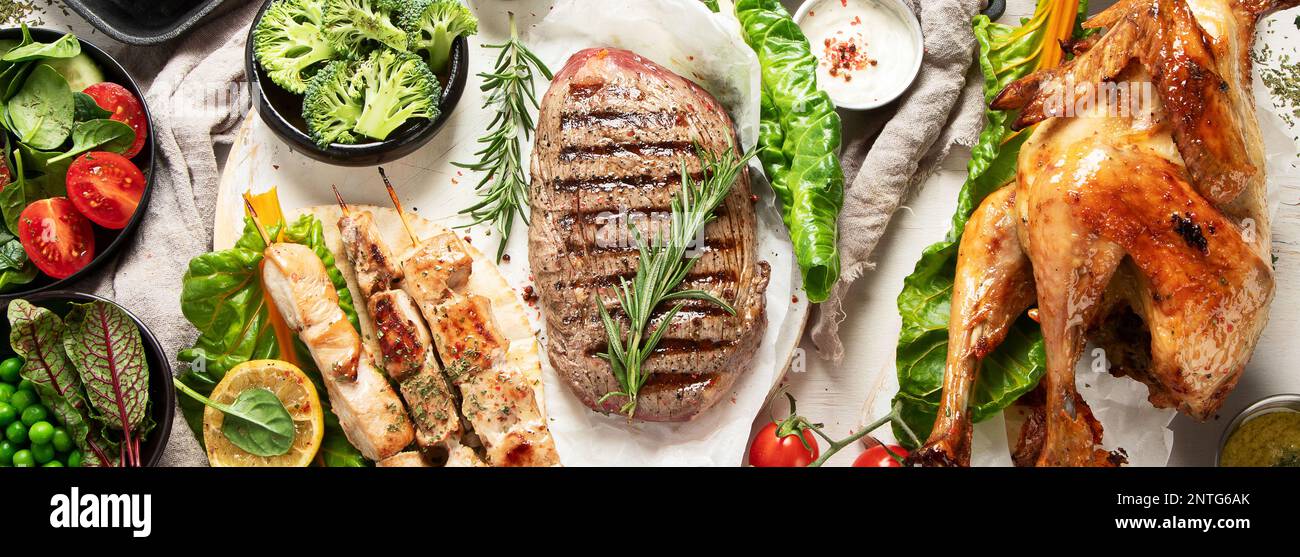 Various types of healthy cooked meat - beef, pork, chicken on a light ...