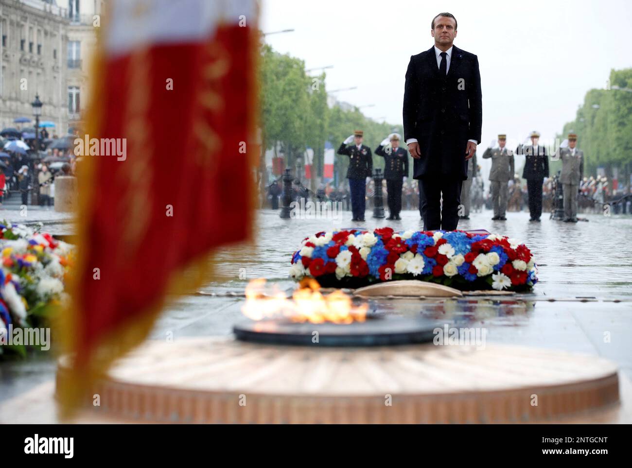French President Emmanuel Macron lays a wreath of flowers at the Tomb ...