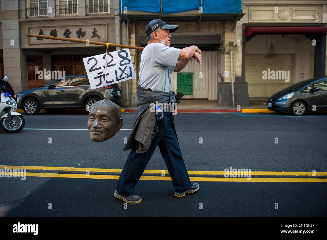 Taipei, Taiwan on 28/02/2023, Man carries Chiang Kai-shek's head ...