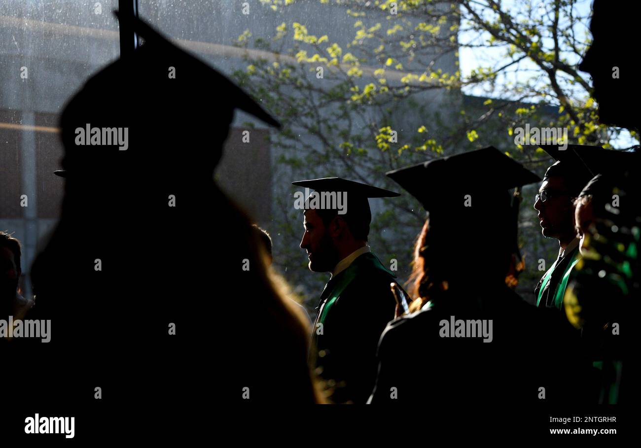 In this May 3, 2018, photo, soon-to-be graduates make their way toward ...