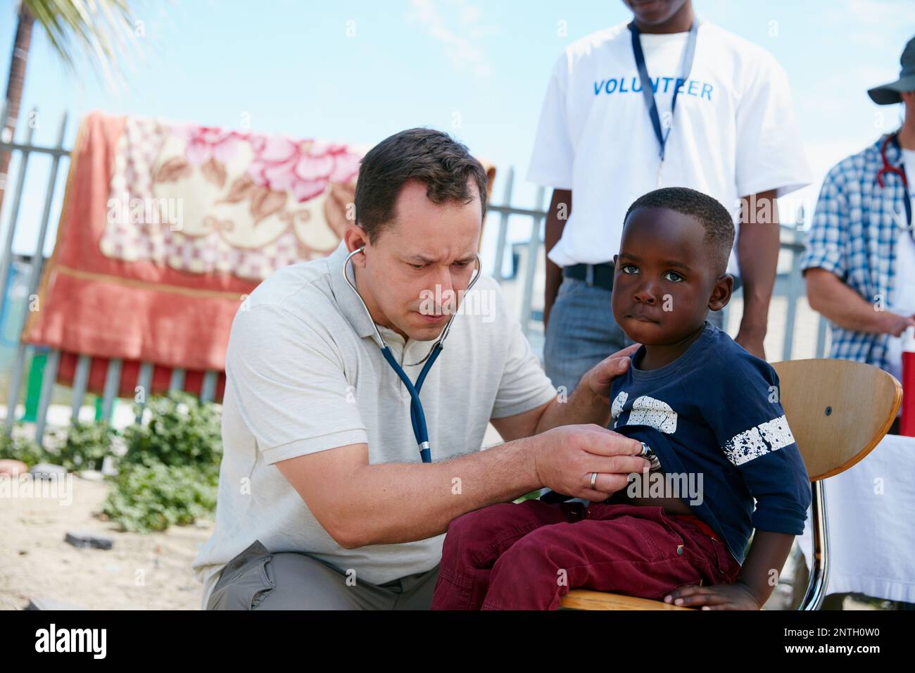 Concerned about the wellbeing of his community. a volunteer doctor ...