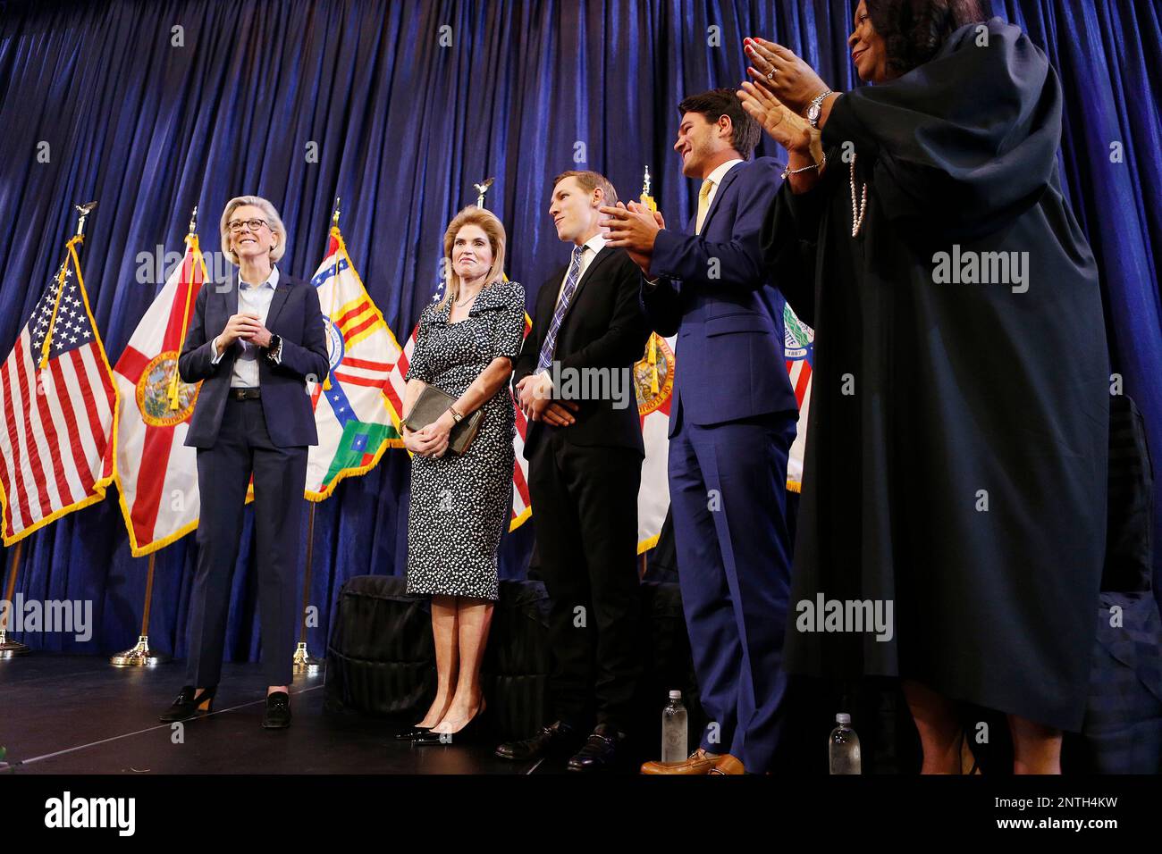 Tampa Mayor Jane Castor, left, smiles as her partner Ana Cruz and her ...