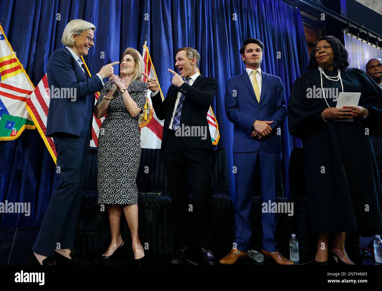Tampa Mayor Jane Castor, left, smiles with her partner Ana Cruz and her ...