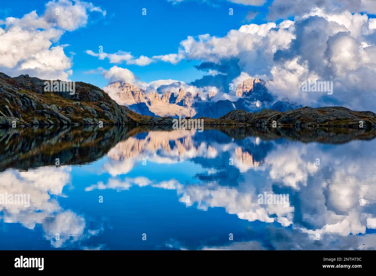 The main range of Brenta Dolomites, partially shrouded in storm clouds ...