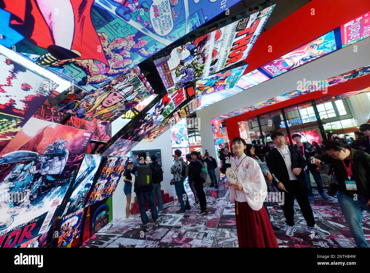 Visitors stop by the Marvel Comics pavilion at the 2019 China ...