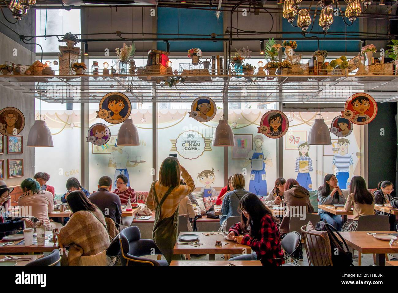 Fans have food at the Detective Conan Cafe in a shopping mall in ...