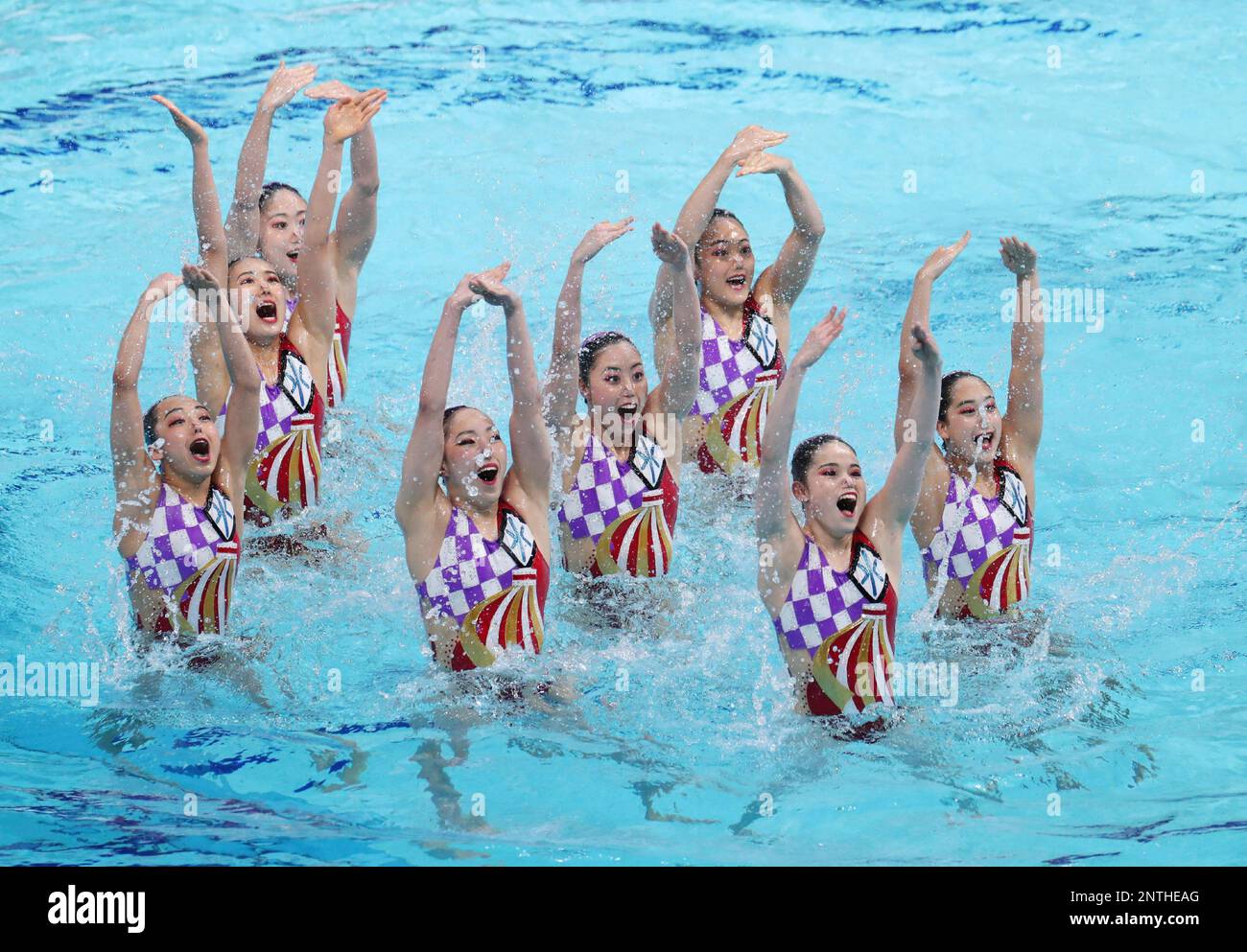 Japan Team's swimmers perform during the Team Free Routine Final of ...