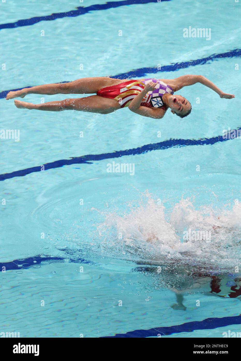 Japan Team's swimmers perform during the Team Free Routine Final of ...