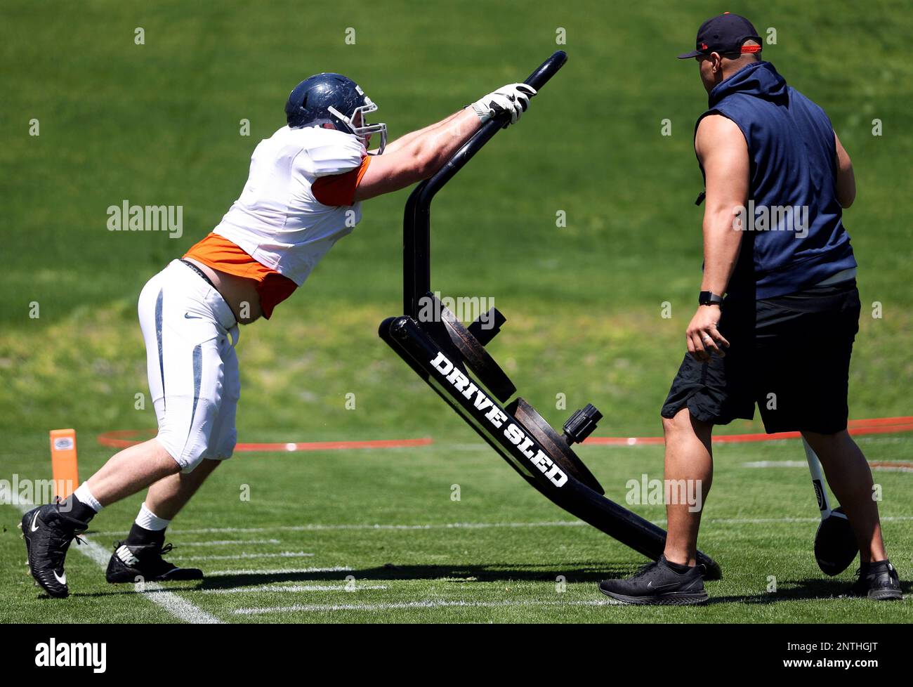 Virginia's Eli Hanback pushes a weight during the team's NCAA college ...