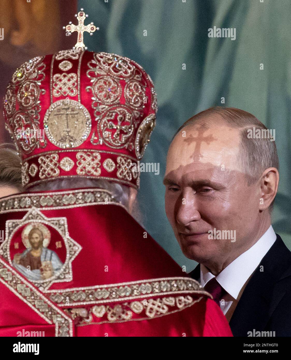 Russian Orthodox Patriarch Kirill, left, talks to President Vladimir ...