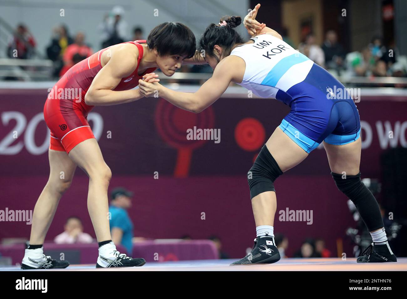 Four-time Olympic wrestling gold medalist Kaori Icho of Japan, left ...