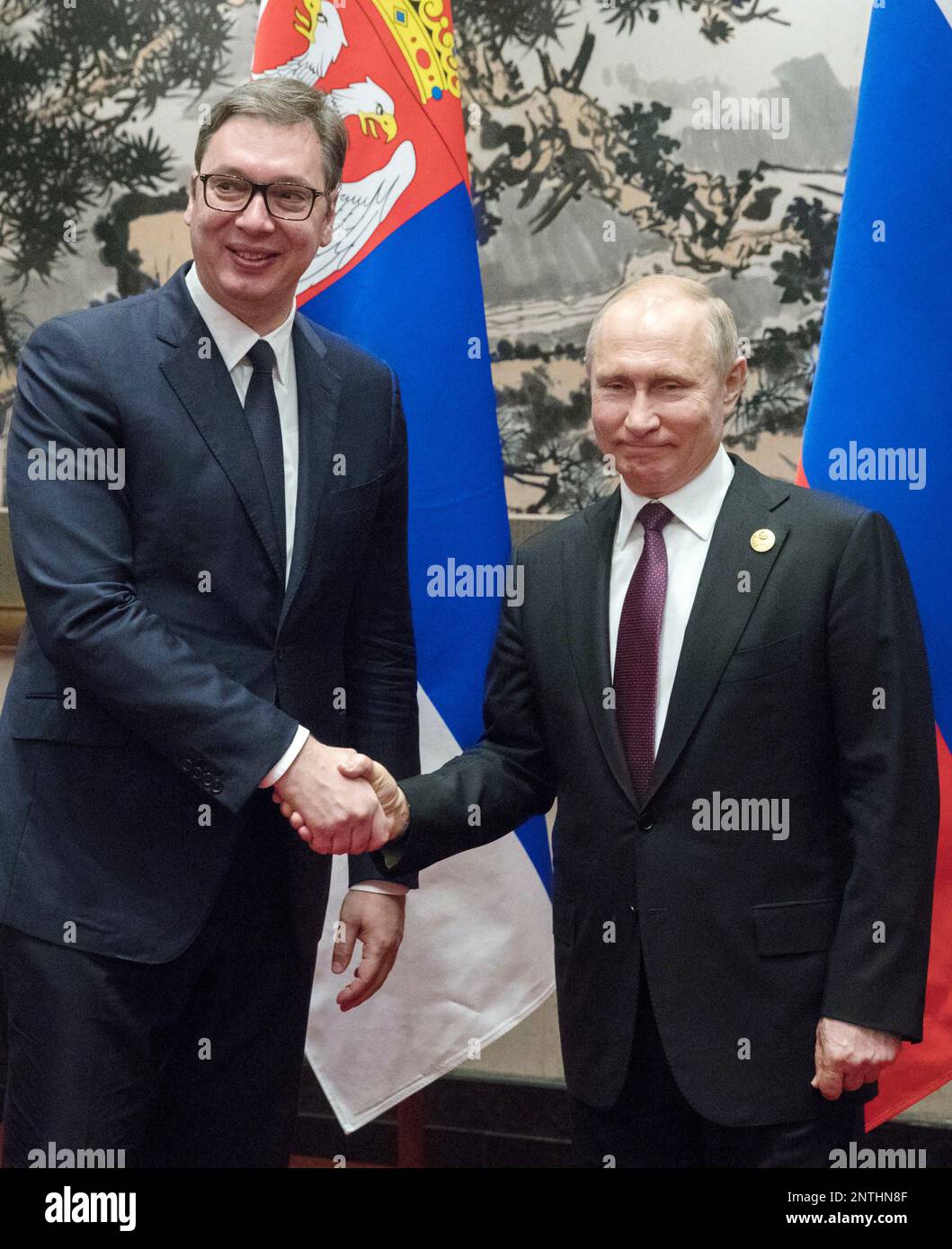 Russian President Vladimir Putin, right, and Serbian President ...