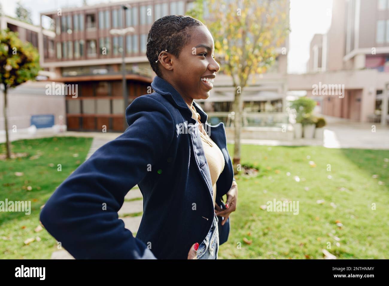 Stylish african female student near university campus Stock Photo - Alamy