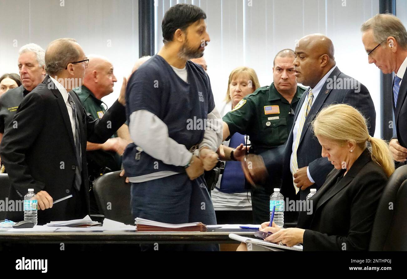 Nouman Raja is led away after he was sentenced to 25 years in prison ...