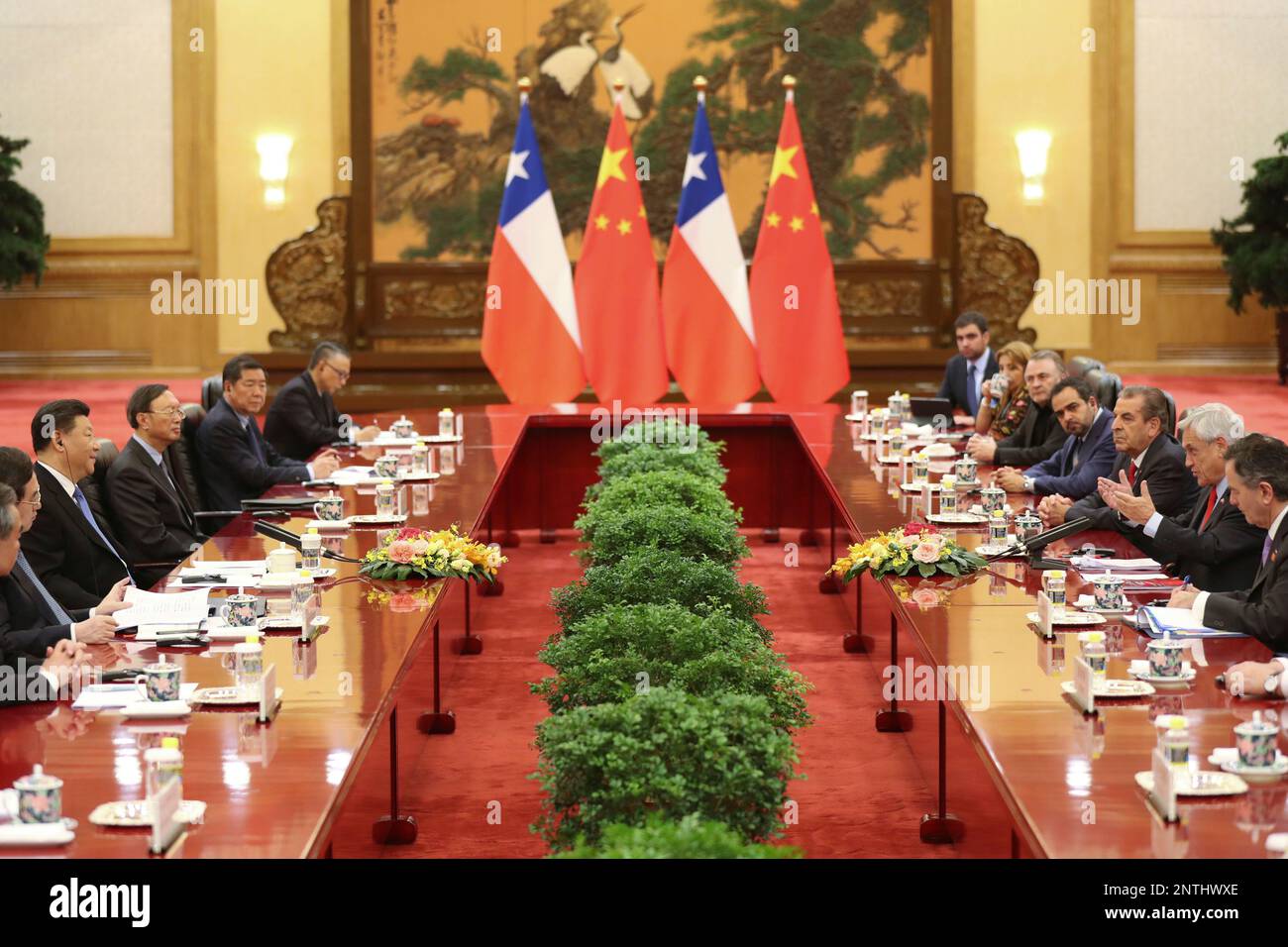 Chinese President Xi Jinping, third left, meets with Chile's President ...
