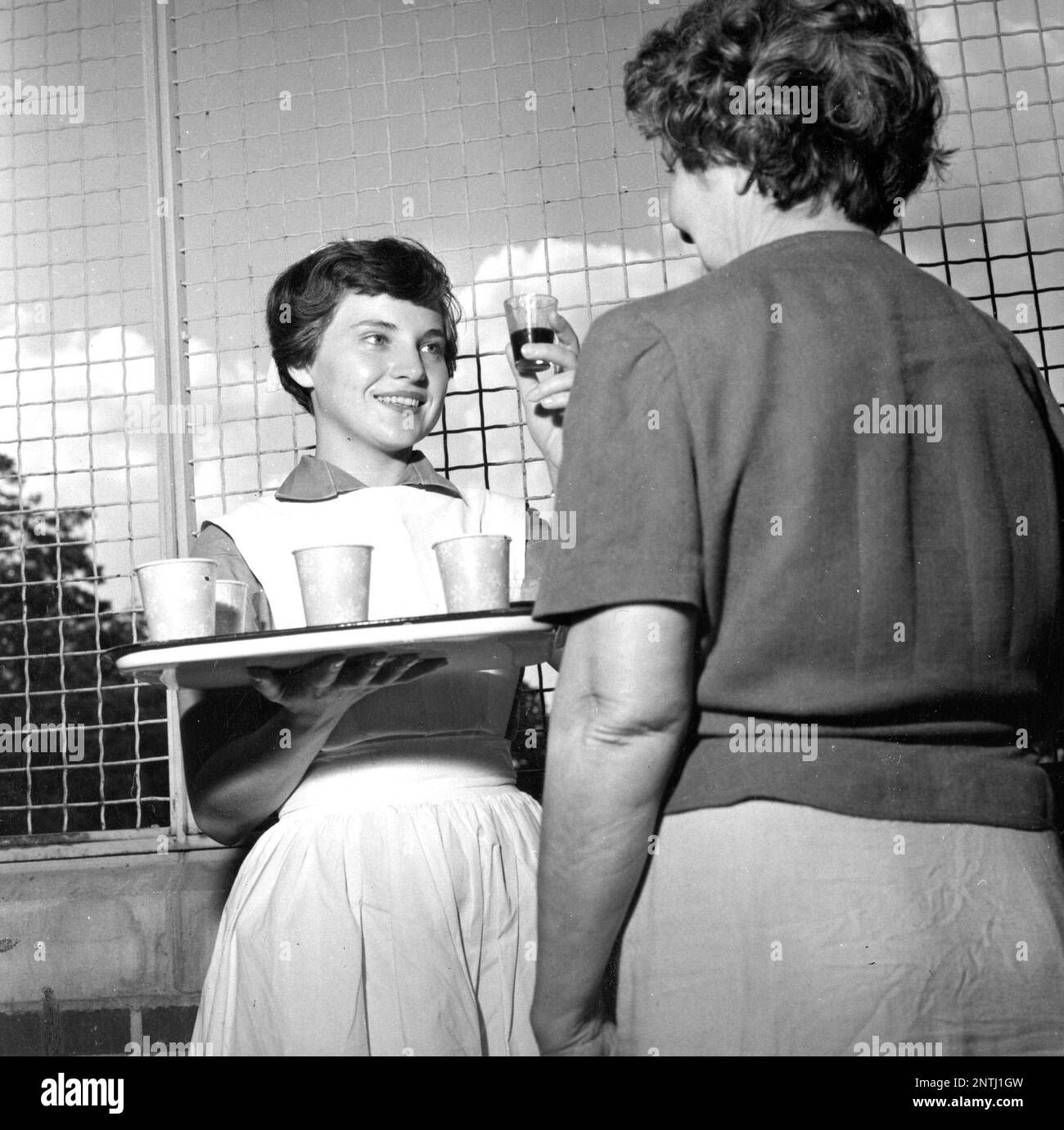 Student nurse Sally Fox persuades a patient to take a sedative and some ...
