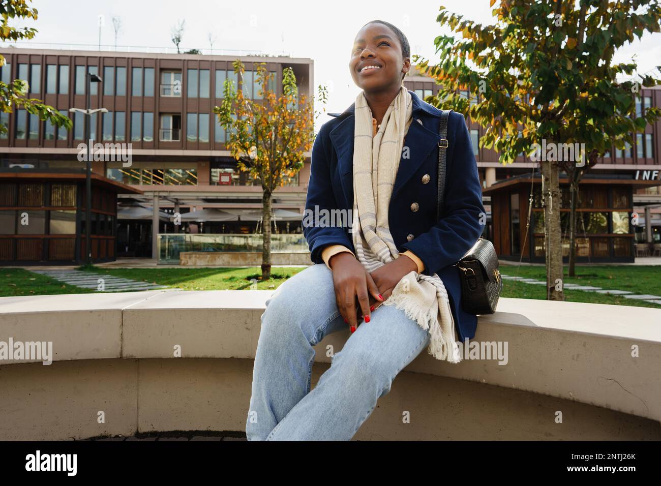 Stylish african female student near university campus Stock Photo - Alamy