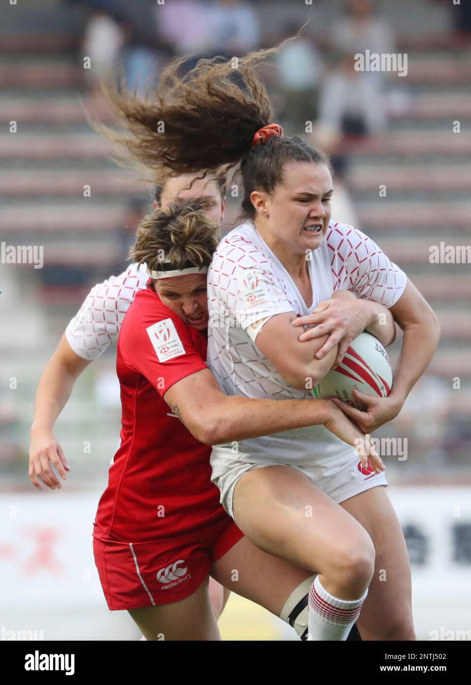 CANADA's Brittany Landy (rear) and ENGLAND's Ellie Kildunne struggles ...