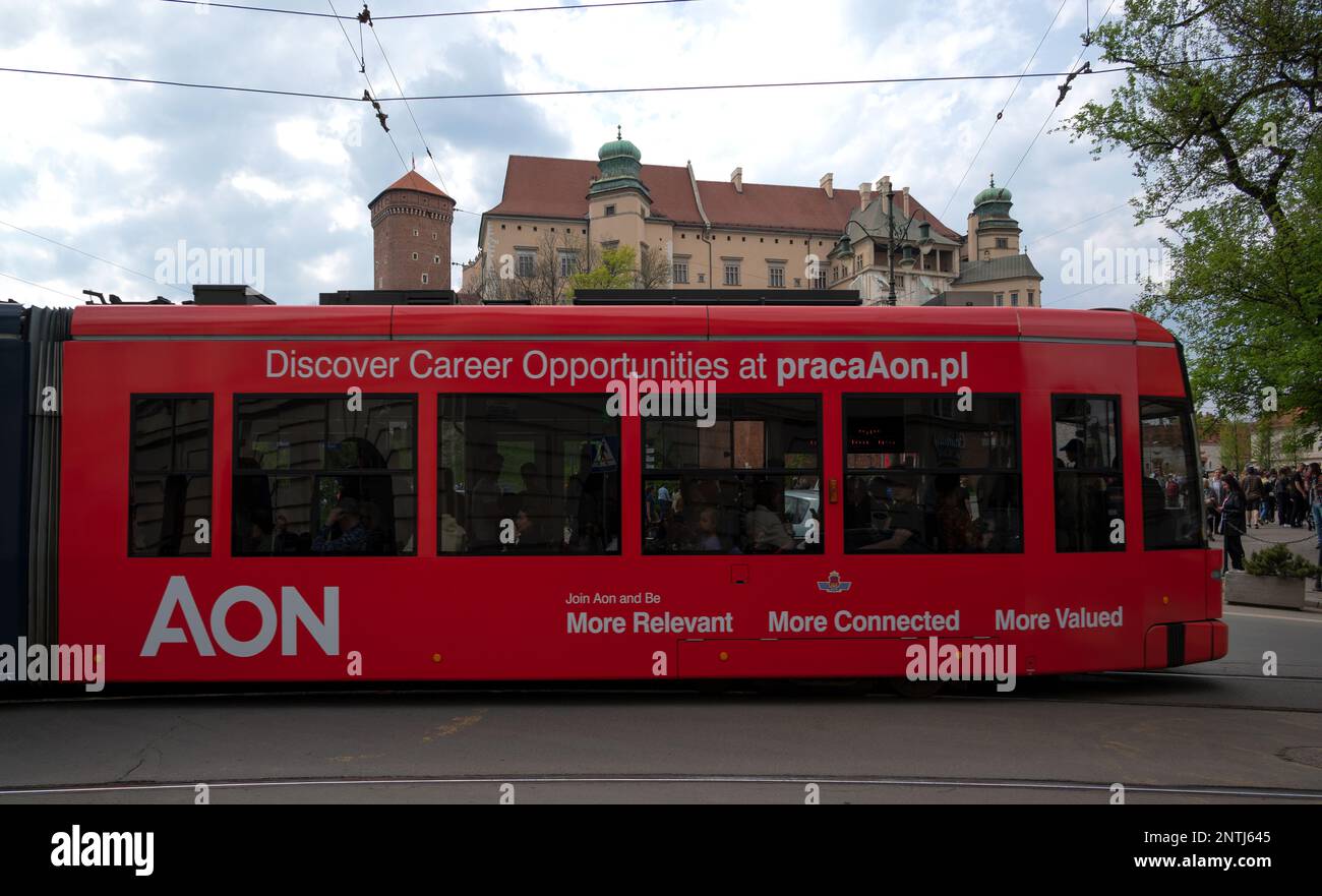 View of a red public transport bus at the old central street near the ...