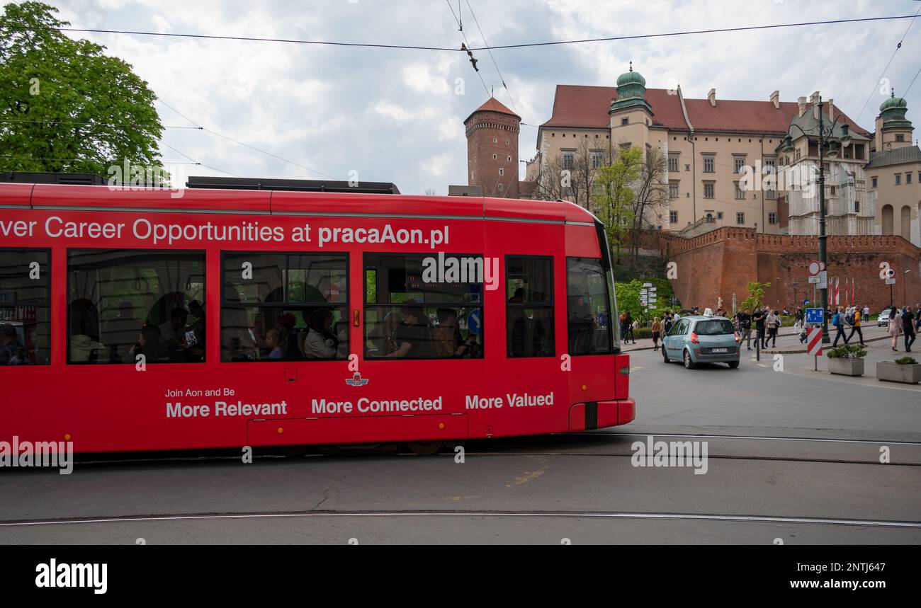 View of a red public transport bus at the old central street near the ...