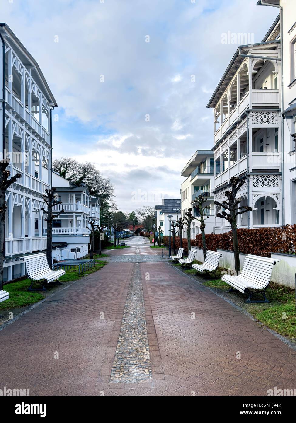 Street between beautiful white houses, residential area Stock Photo - Alamy