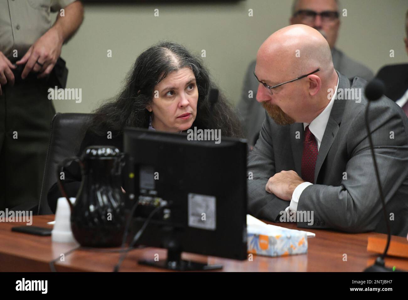 Louise Turpin, left, listens to her attorney, Jeff Moore, during a ...