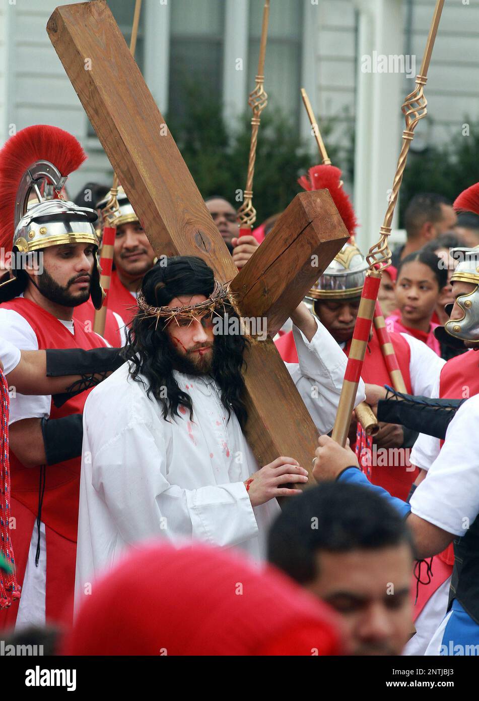 A Good Friday procession and re-enactment of the Stations of the Cross ...