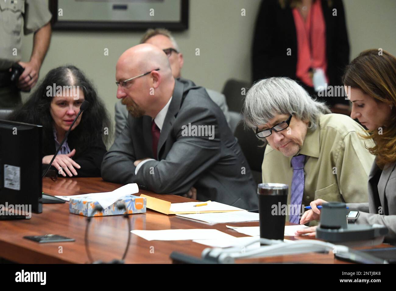 David Turpin, second from right, and wife, Louise, left, sit in a ...