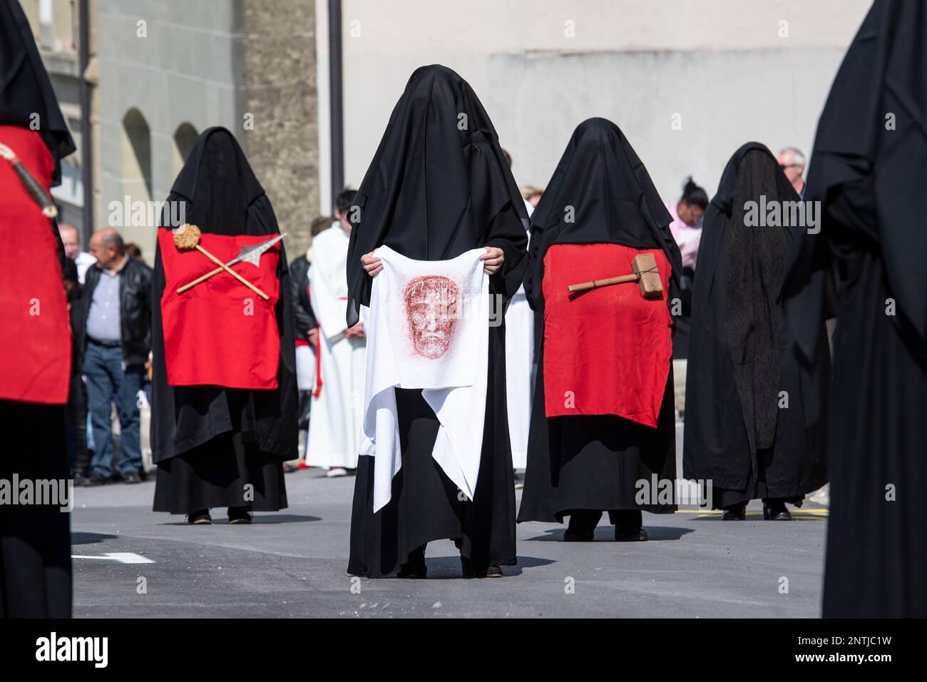 Veiled women known as "Les Pleureuses" or mourning women are covered ...