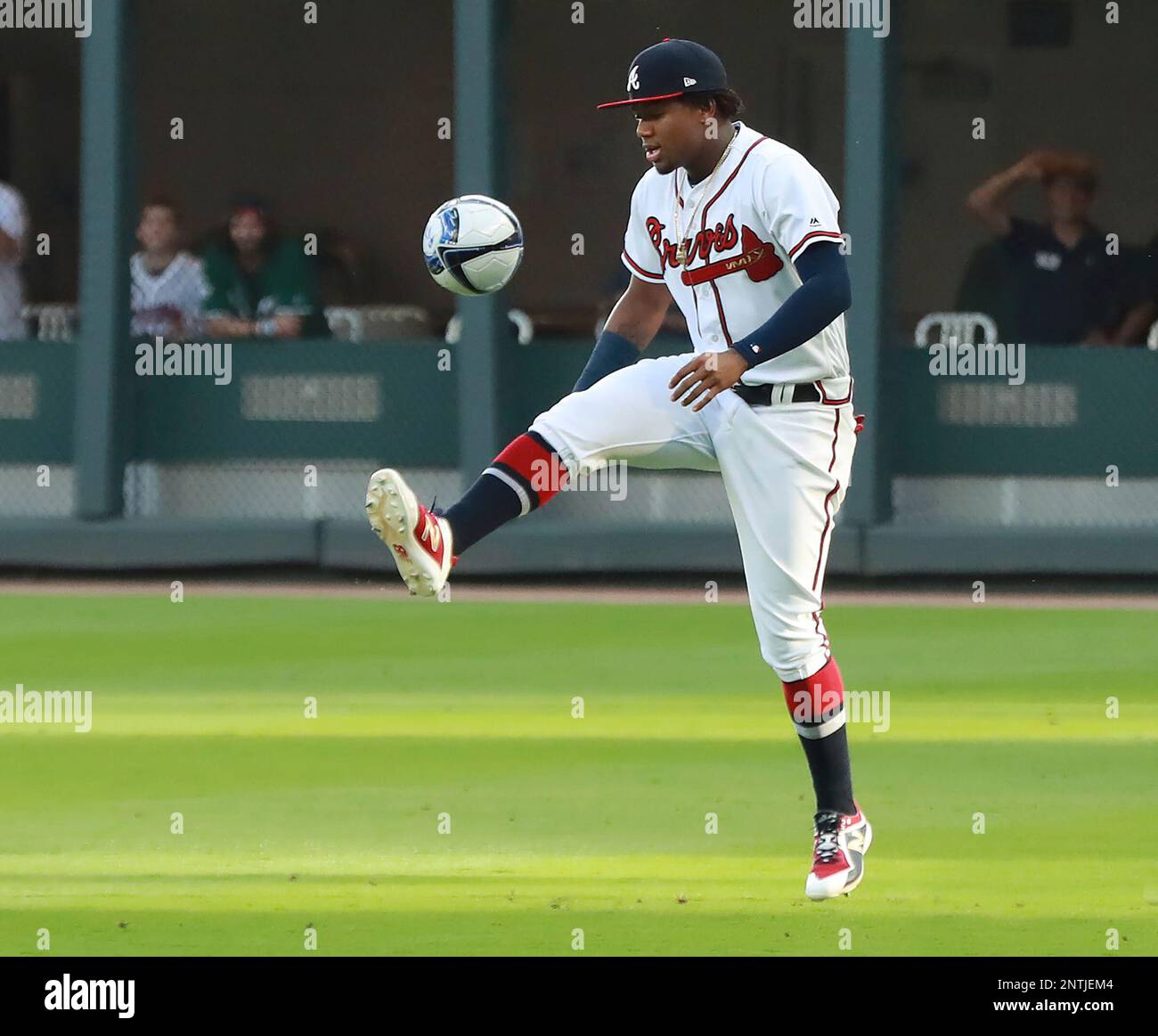 Atlanta Braves' Ronald Acuna Jr. kicks around a soccer ball in the ...