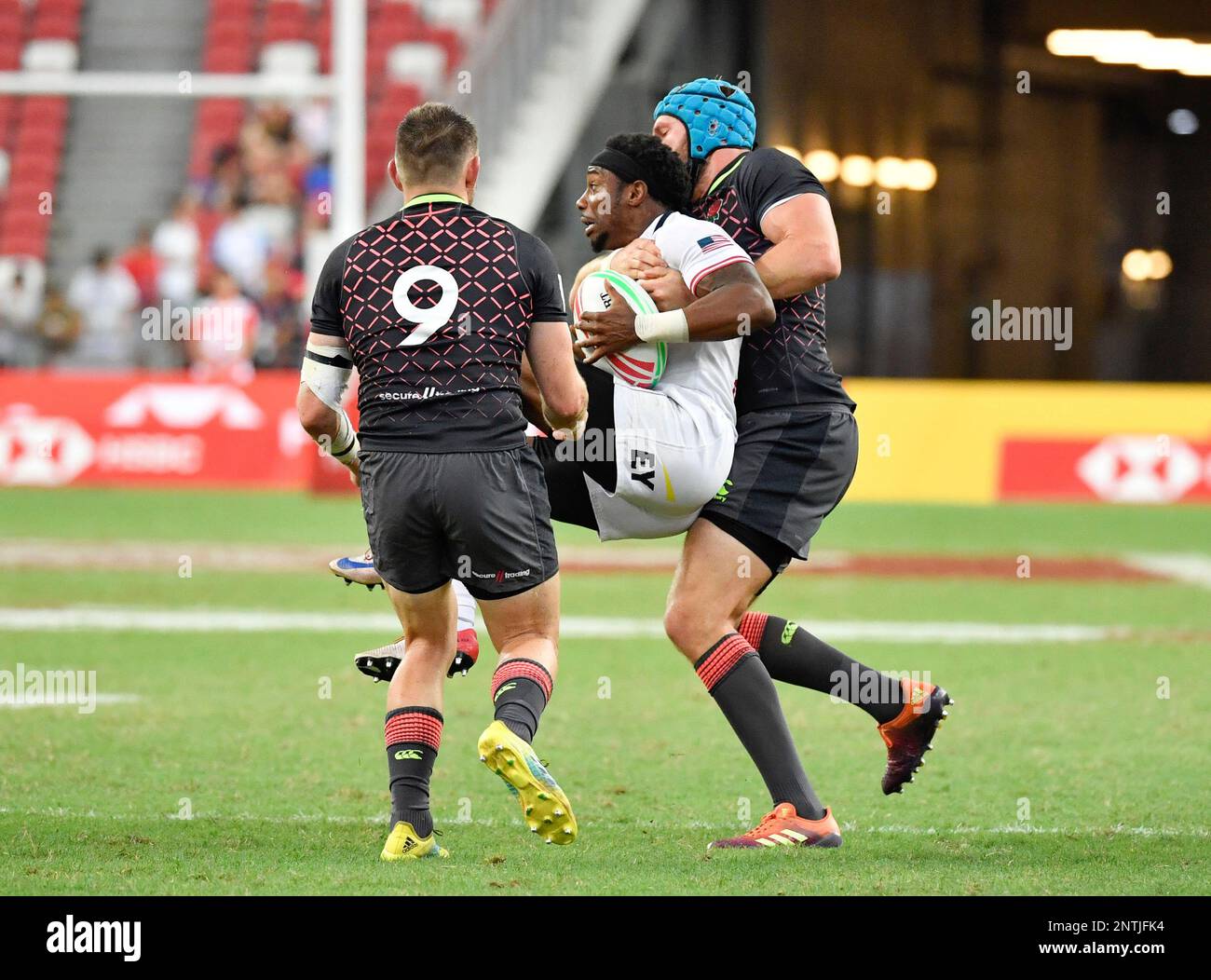 USA's Carlin Isles is lifted off the ground by England's Richard de ...