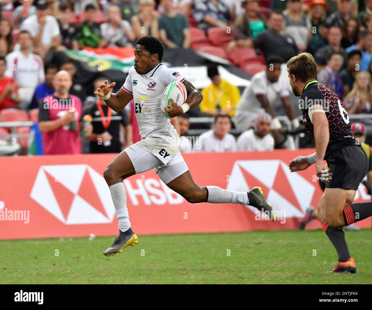 USA's Kevon Williams breaks through the England defence during the HSBC ...