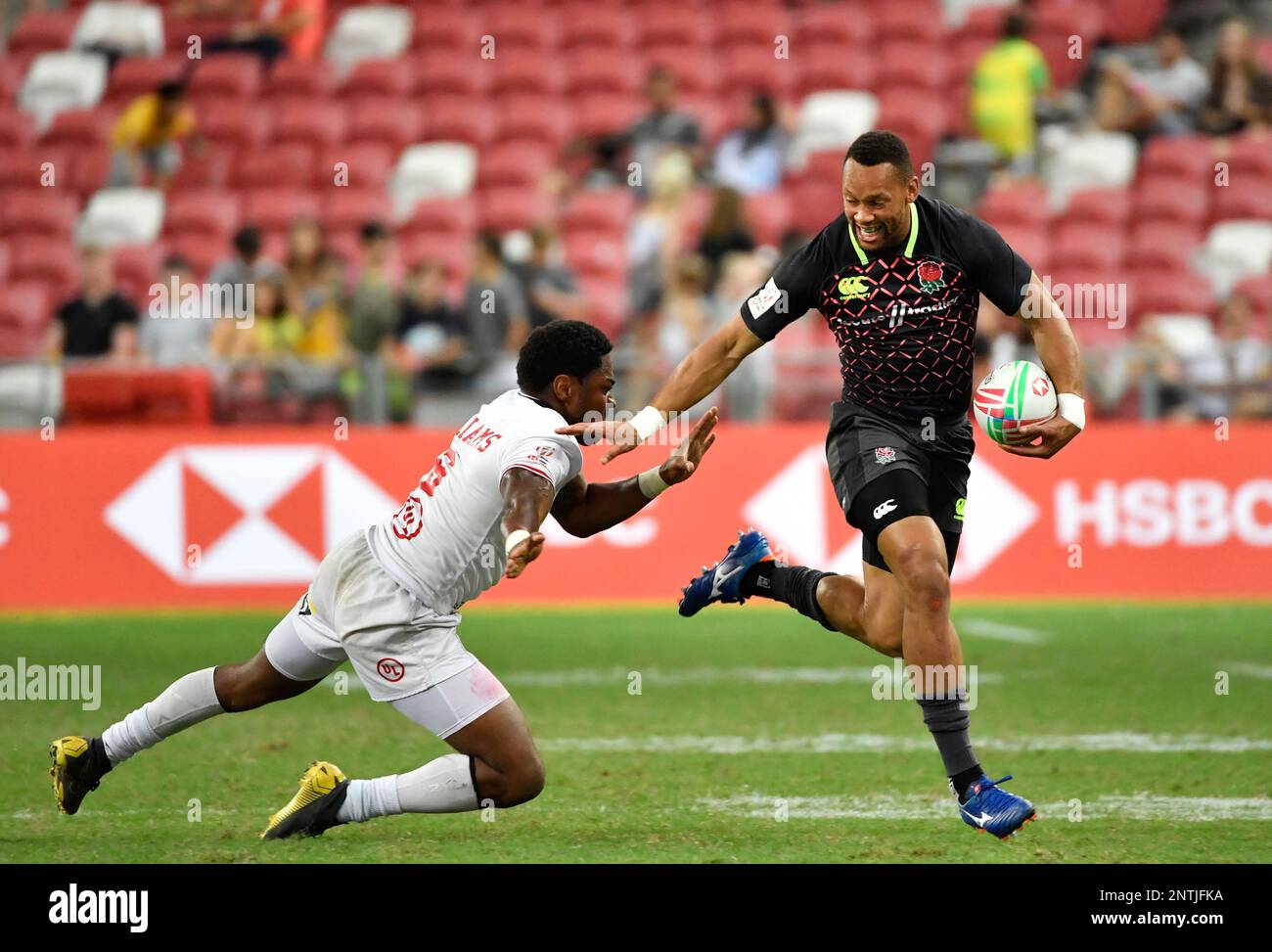 England's Dan Norton hands-off USA's Kevon Williams during the HSBC ...