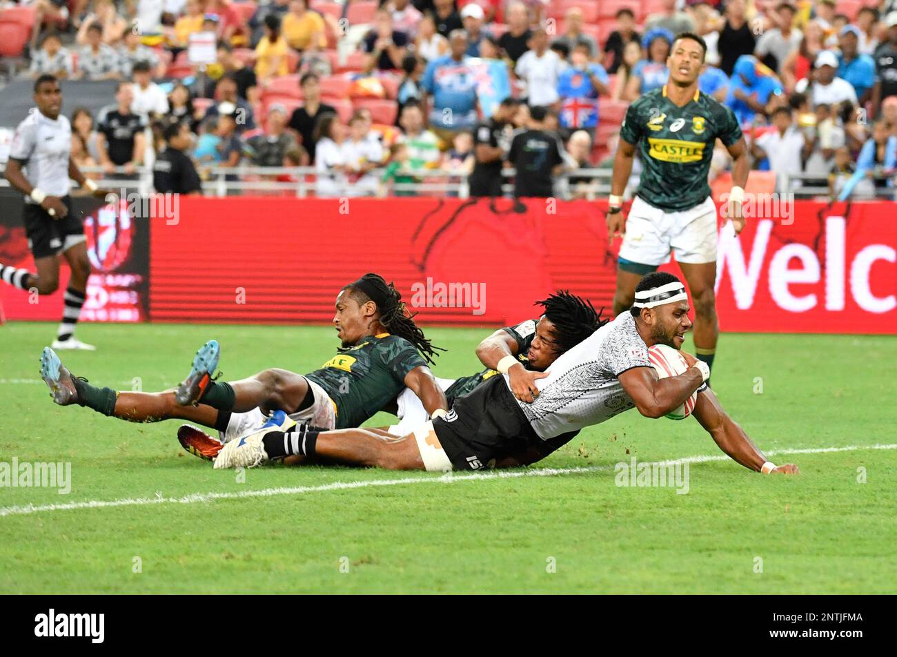 Fiji's Vilimoni Botitu dives over for Fiji's second try during the HSBC ...