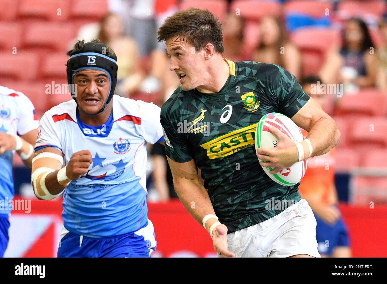 South Africa's Impi Visser breaks past Samoa's Laalio Leilua during the ...