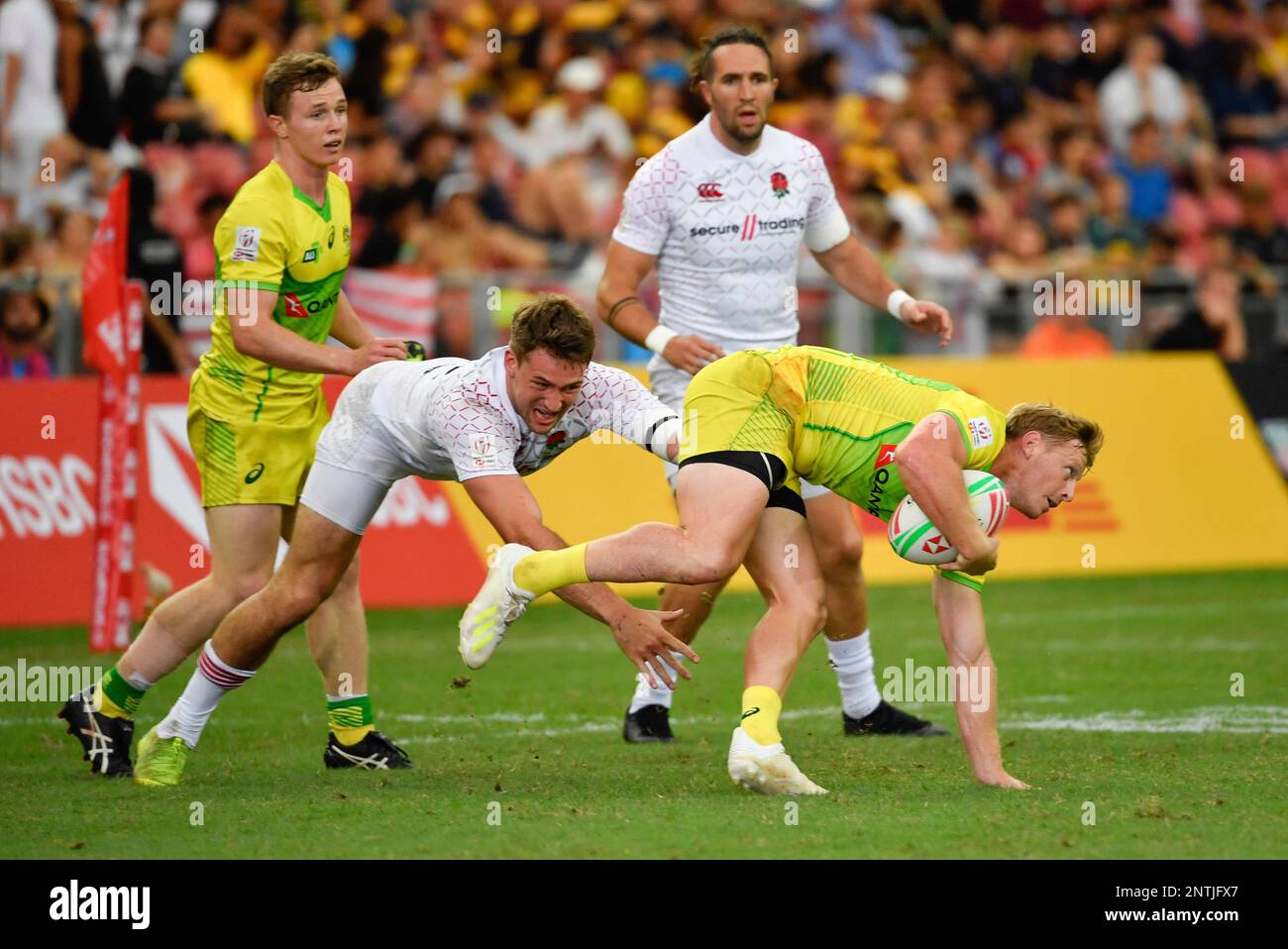 England's Harry Glover tackles Australia's Lachlan Miller during the ...