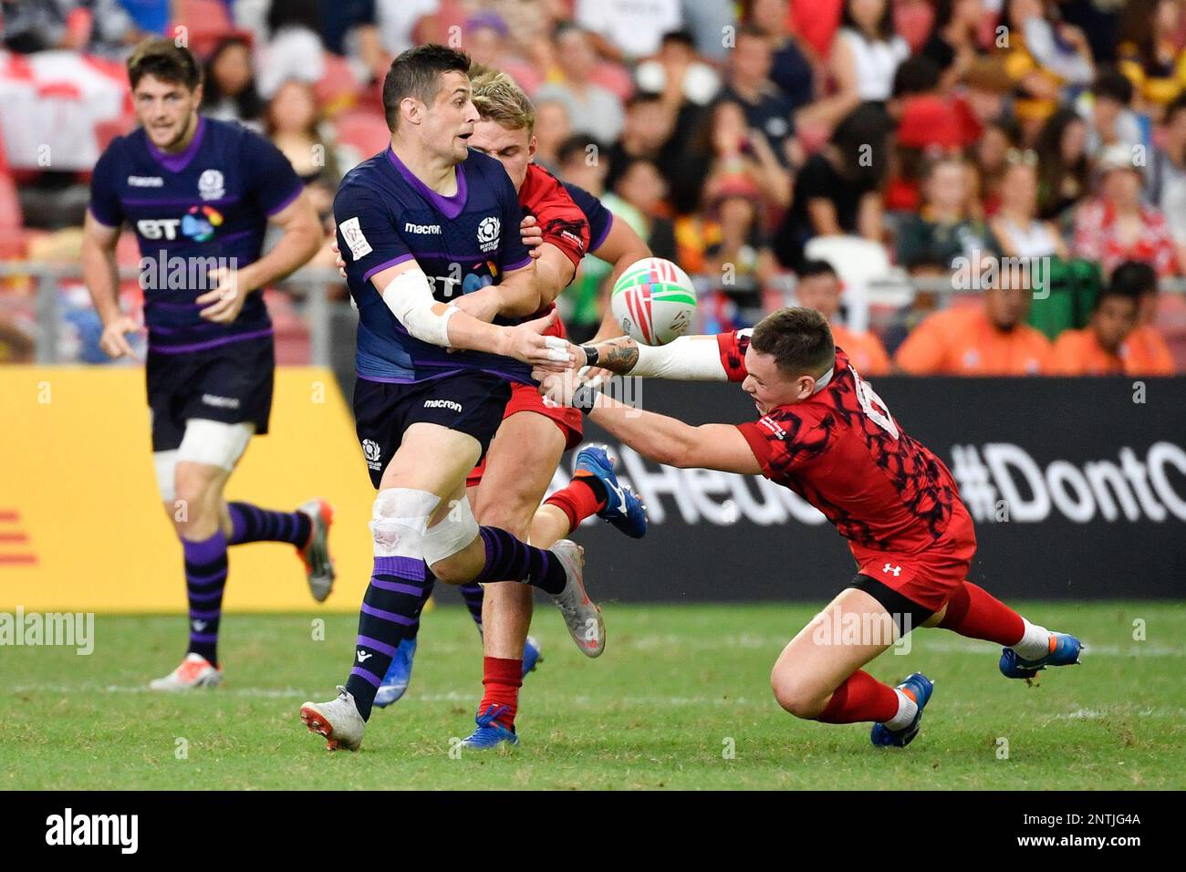 Scotland's Jamie Farndale off-loads during the HSBC Singapore Rugby ...