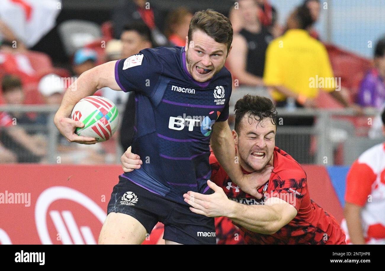 Scotland's Max McFarland makes a break past Wales's Rueben Morgan ...